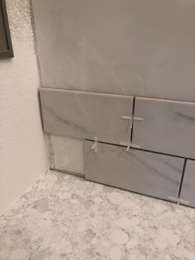 DIY Easy Bathroom Tile Wall - Frills and Drills